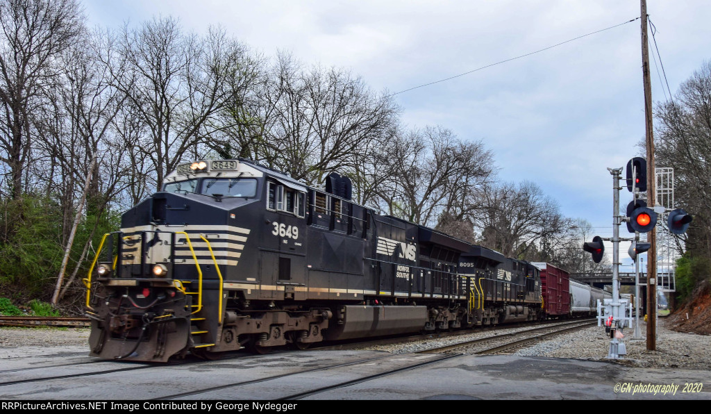 NS 3649 & 8095 lead a long freight train